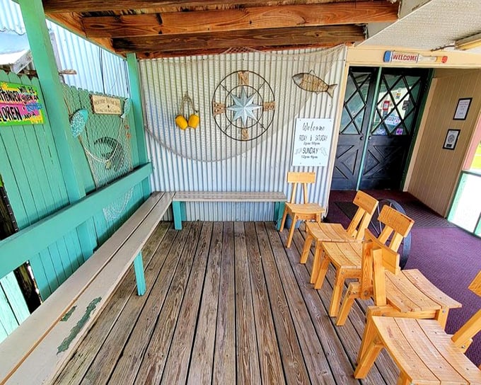 The waiting area feels like your fishing buddy's porch – weathered wood, nautical touches, and the anticipation of great things to come.