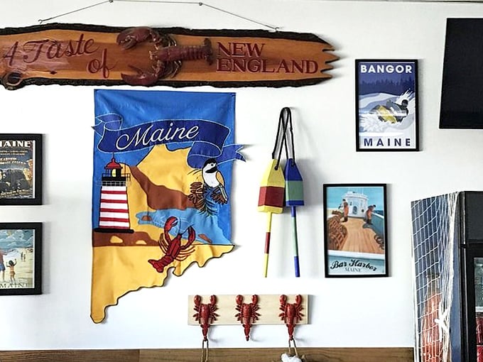 Wall decorations that remind you this isn't just a restaurant—it's a portal to Maine. That wooden sign has seen some stories.