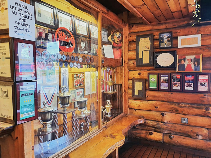A trophy case that tells the story better than words could – decades of awards that prove this isn't just good barbecue, it's historically significant.