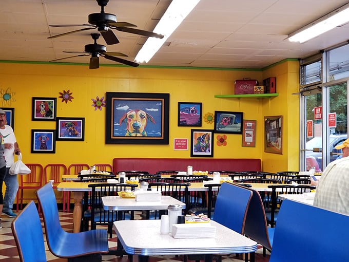 Colorful wall art adds personality to this cheerful breakfast haven's welcoming dining atmosphere.