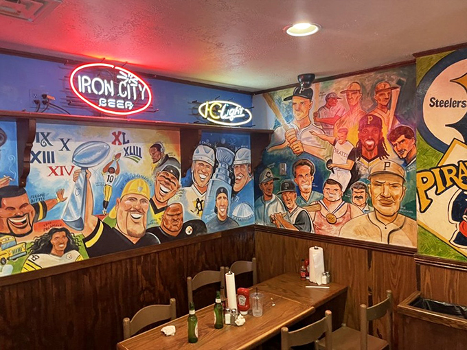 The wall of fame where Pittsburgh legends become permanent dinner guests who never judge your eating technique.