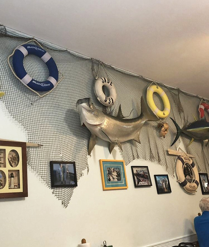 Wall decorations that tell stories of the sea – where every mounted fish seems to be saying, "My cousins taste delicious here."