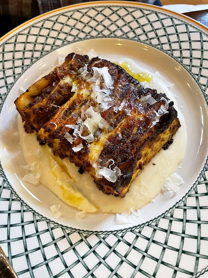 Lasagna reimagined: caramelized edges, creamy interior, and enough cheese to make Wisconsin nervous—comfort food elevated to art form.