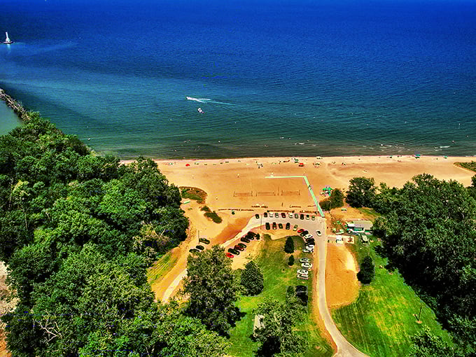 Lake Erie's beachfront real estate, seen from above—where "getting away from it all" still includes volleyball courts and ice cream.