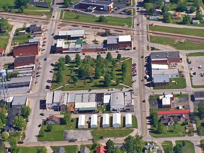 This aerial view reveals Seymour's thoughtful layout, with its central green space surrounded by businesses – small-town planning at its finest.