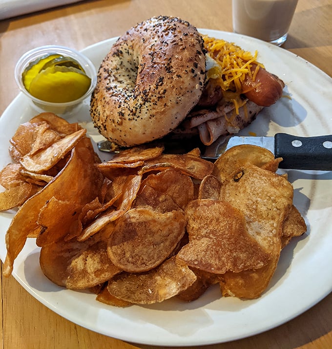 This bagel sandwich isn't playing around—it's serious about protein, and those homemade chips are the supporting actors stealing the scene.