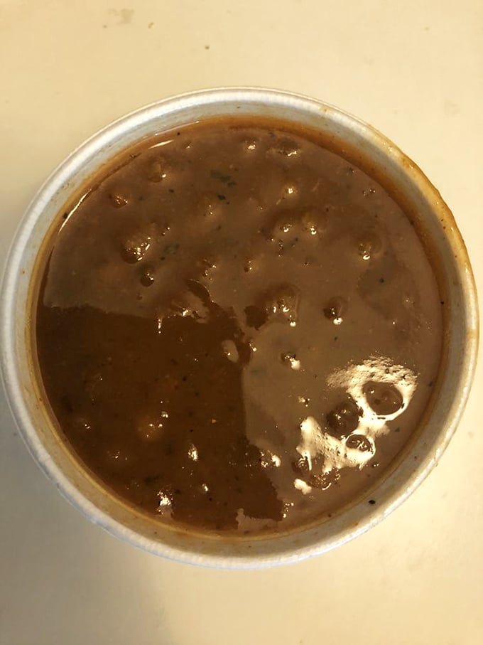 These baked beans have clearly been simmering with purpose, absorbing all those smoky, sweet, and savory flavors into each tender bite.