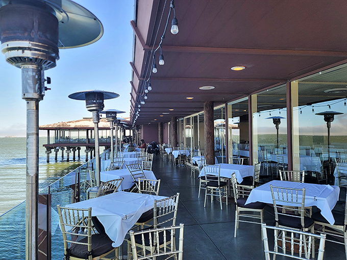 The outdoor deck seating proves that white tablecloths and sea breezes are the perfect pairing – especially when heaters keep the fog's chill at bay.