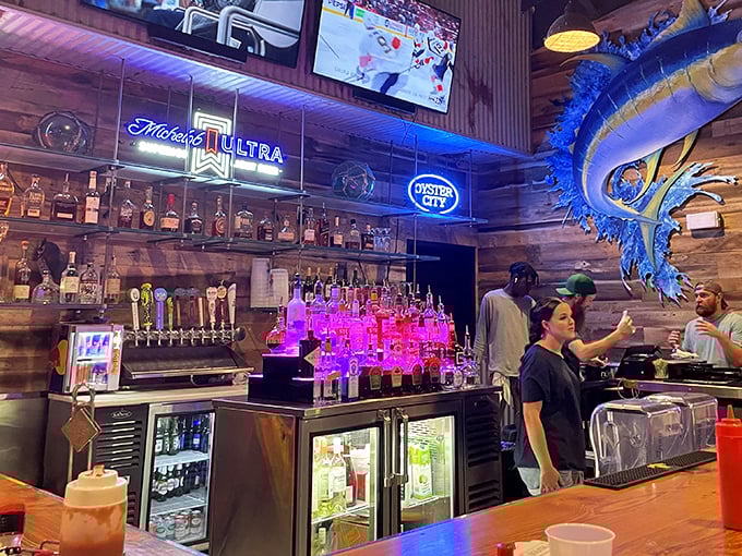 The bar isn't just serving drinks—it's creating liquid companions for seafood feasts. That marlin on the wall has seen some celebrations.