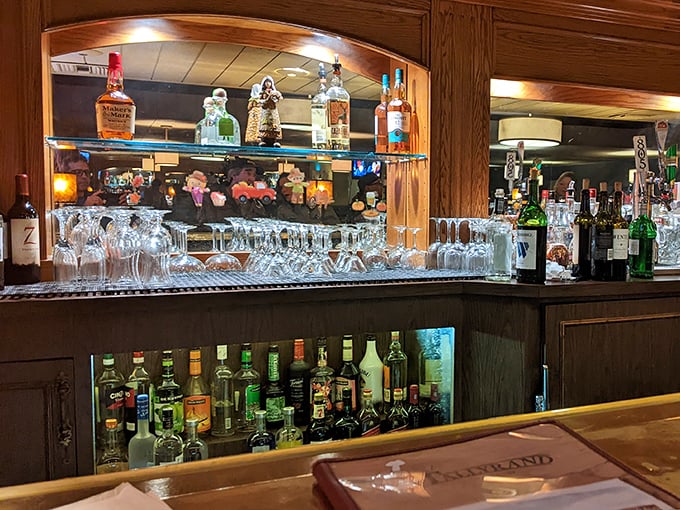 The bar area—where locals have been solving the world's problems over cocktails for decades. If these bottles could talk...