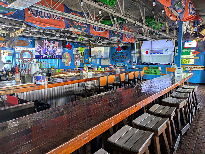 The bar area – where fishing stories get taller, friendships grow stronger, and nobody minds if you linger until the sunset fades to stars.