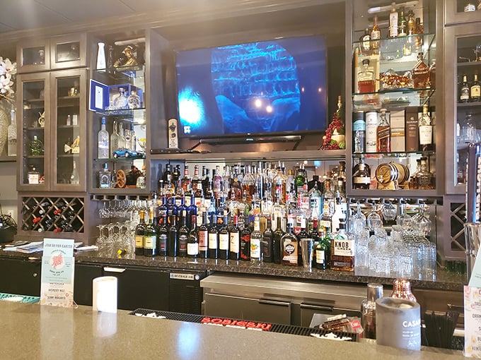 The fully-stocked bar isn't just impressive—it's a liquid library where every bottle tells a story waiting to be poured.