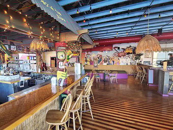 Tiki-inspired bar area where grass skirt decor meets nautical flair – a playful space where rum drinks and sea shanties wouldn't feel out of place.