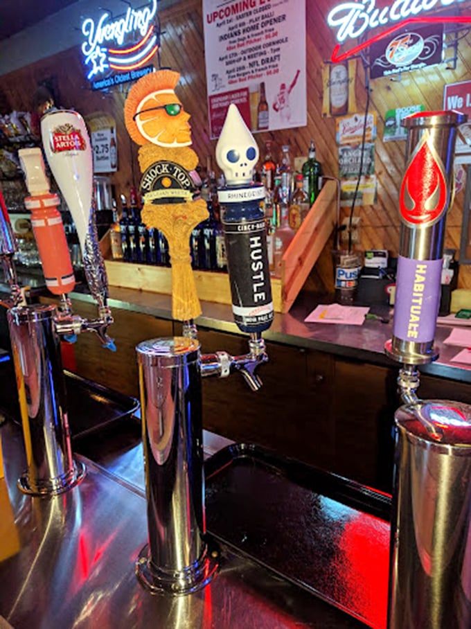 Beer tap artistry that promises liquid refreshment. Each handle tells a story about what's flowing beneath.