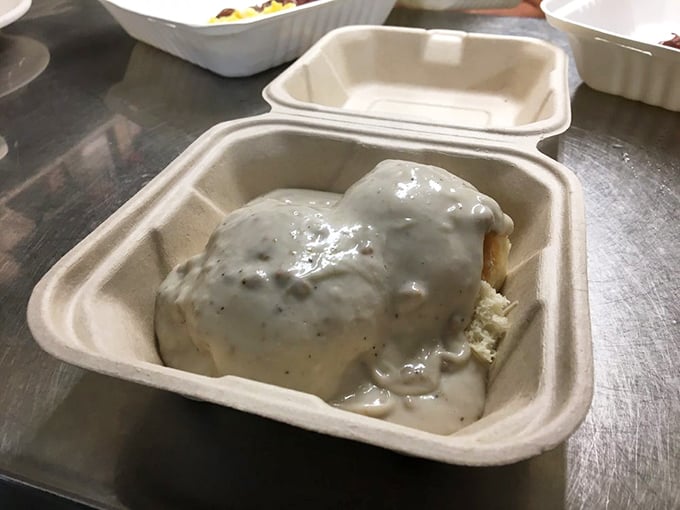 Biscuits and gravy – the breakfast equivalent of a warm hug from your favorite grandparent, smothered in peppery comfort.