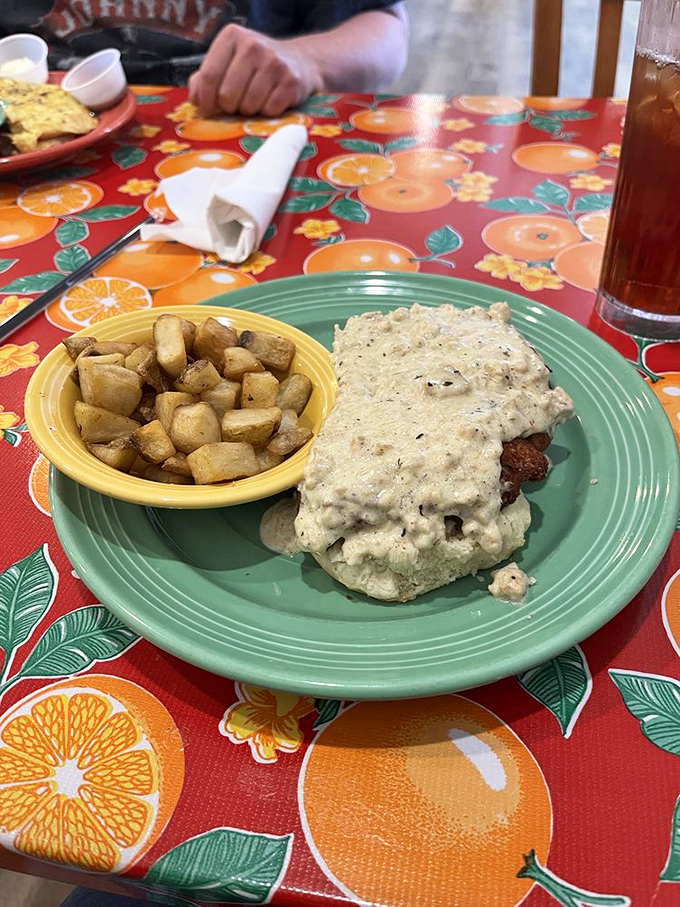 Biscuits and gravy with potatoes—the breakfast equivalent of a warm hug from your favorite Southern grandma.