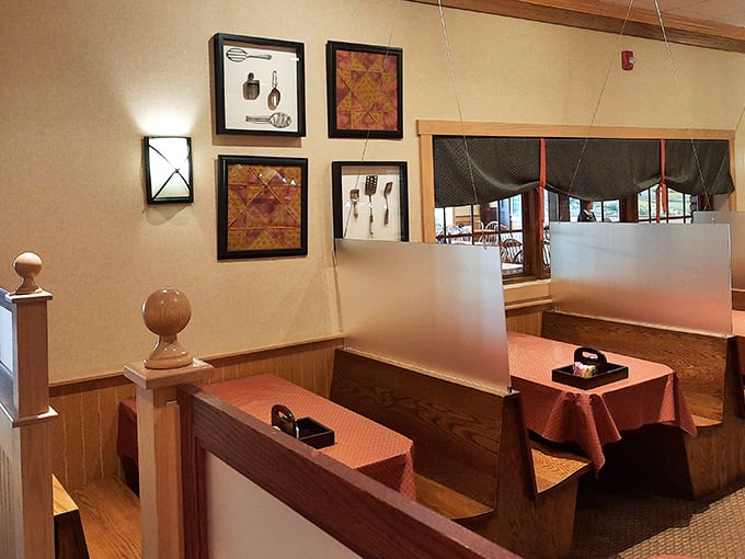 Cozy booth seating with just enough privacy for intimate conversations or the occasional "nobody's looking, try this bite" moment.