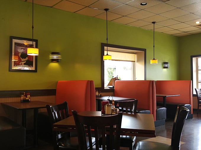 These booths aren't just seating—they're breakfast sanctuaries where important decisions like "syrup or no syrup" are contemplated in comfort.