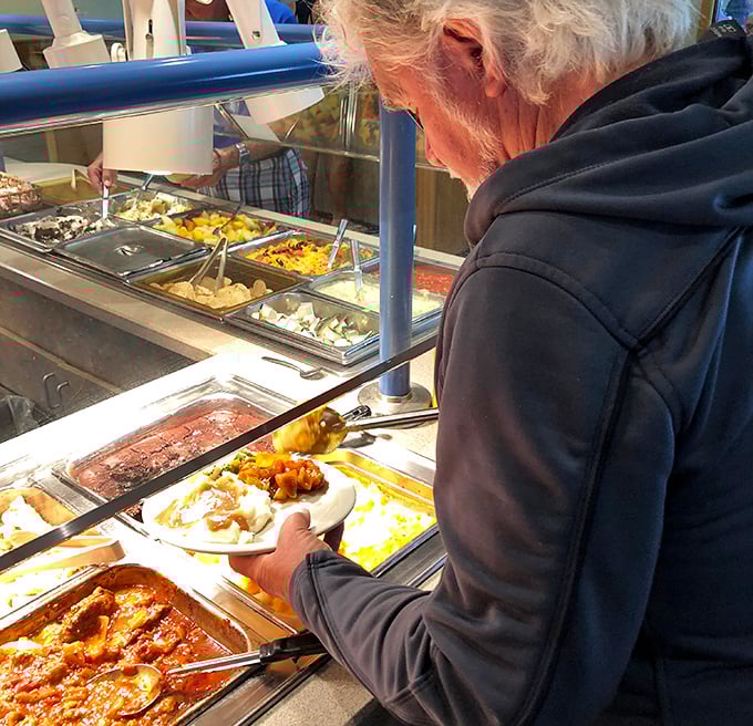 The buffet line at Rob's isn't just food service—it's a parade of homestyle favorites where every scoop tells a story of recipes perfected over countless servings.
