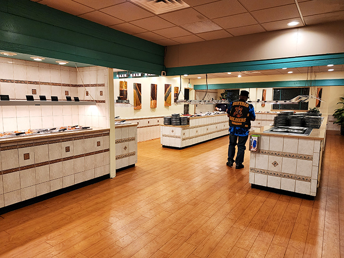The buffet counters await the hungry masses – a blank canvas soon to become a masterpiece of culinary excess.