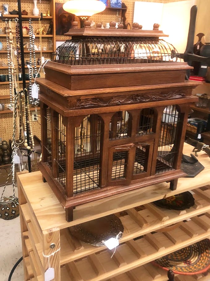 This ornate birdcage wasn't designed for actual birds but for showing off wealth—the Victorian equivalent of installing a home theater you rarely use.