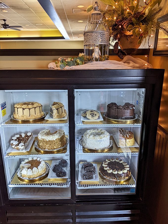 The dessert case—where willpower goes to die. Each cake is like a contestant on a delicious reality show, competing for your affection and stomach space.
