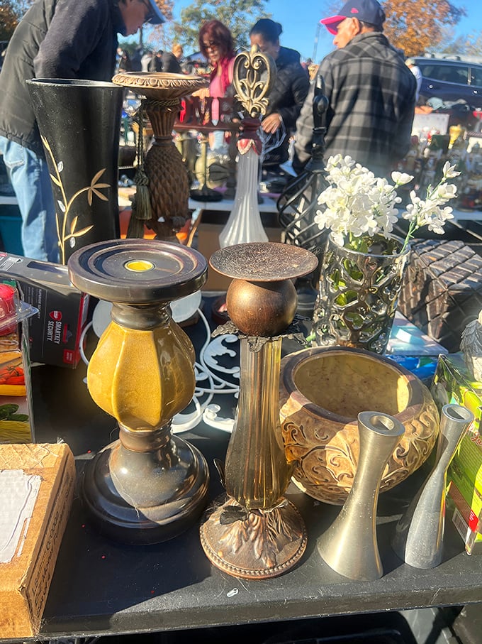 Home décor with history! These candleholders and vases are ready to add character to someone's mantel—each with its own golden personality.