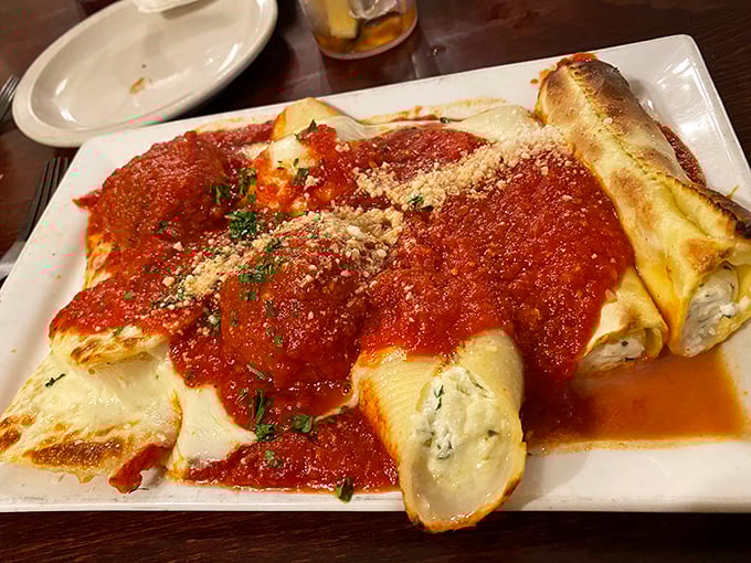 These cannelloni, blanketed in rich tomato sauce and dusted with parmesan, aren't just pasta – they're edible therapy after a long week.