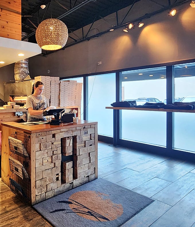 The host stand—where pizza dreams begin. Simple, rustic, and welcoming, like the first chapter of a delicious story.
