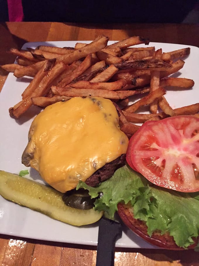 This cheeseburger doesn't mess around – it's serious business wrapped in melted cheese and pure satisfaction.