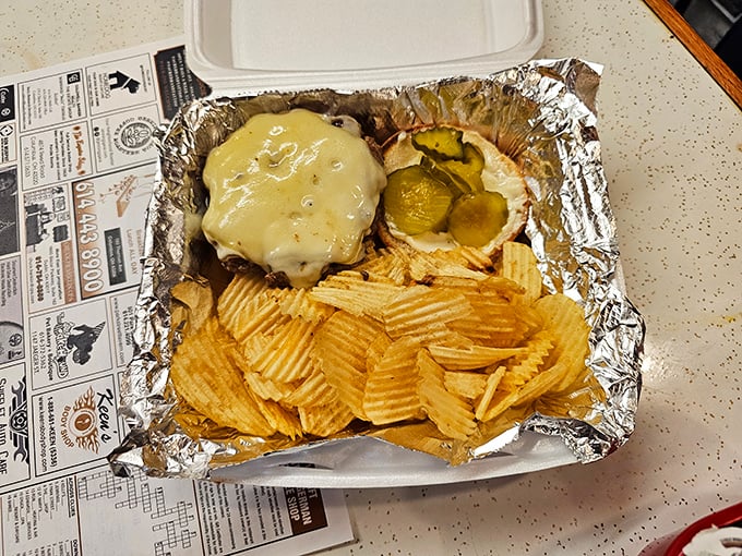 This isn't just takeout—it's a foil-wrapped promise that comfort food travels well from their griddle to your grateful hands. 
