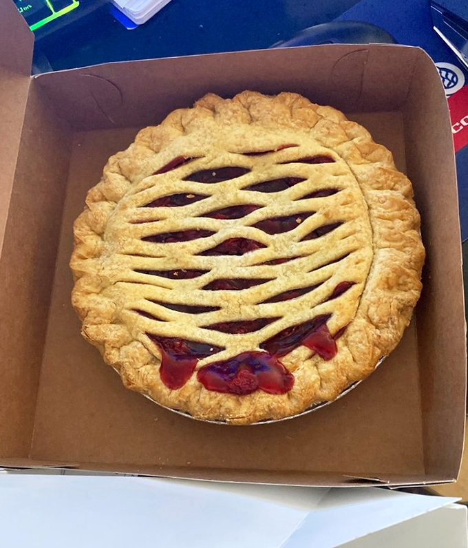 Cherry pie with that lattice top your grandmother aspired to perfect – the filling peeking through like ruby gems.