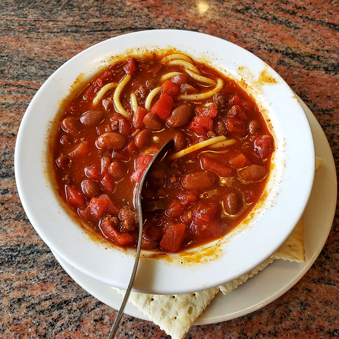 This isn't just chili—it's a spicy, bean-laden hug in a bowl, with spaghetti noodles playing the unexpected but welcome guest.