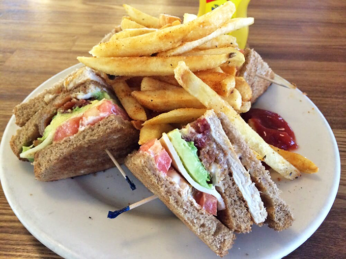 The club sandwich – architecture's greatest contribution to lunch, with layers that tell a story of perfect balance and harmony.