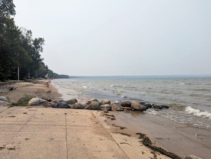 Concrete meets nature at Brimley's edge – human engineering and Superior's power finding respectful coexistence.