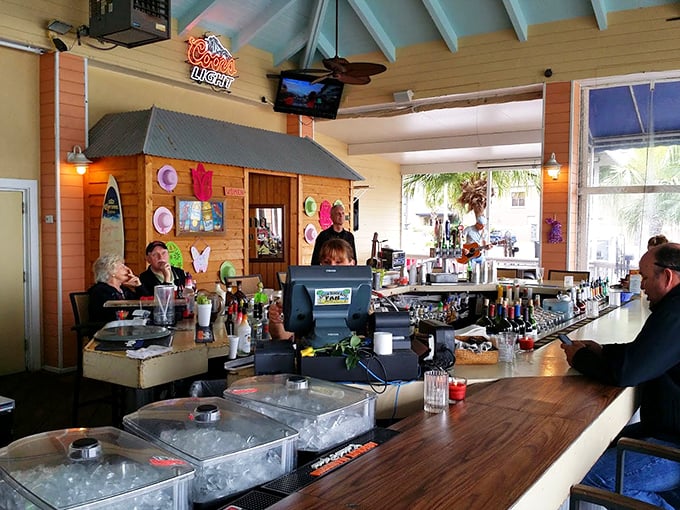 The bar area—where seafood stories get taller and cocktails get stronger as the evening progresses. A front-row seat to coastal conviviality.