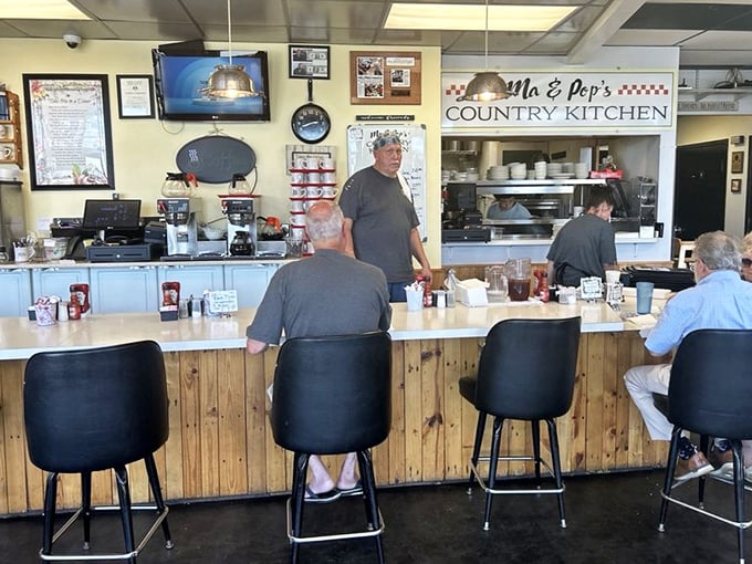 The counter—that sacred space where solo diners find community and breakfast philosophers ponder life's mysteries over bottomless coffee.