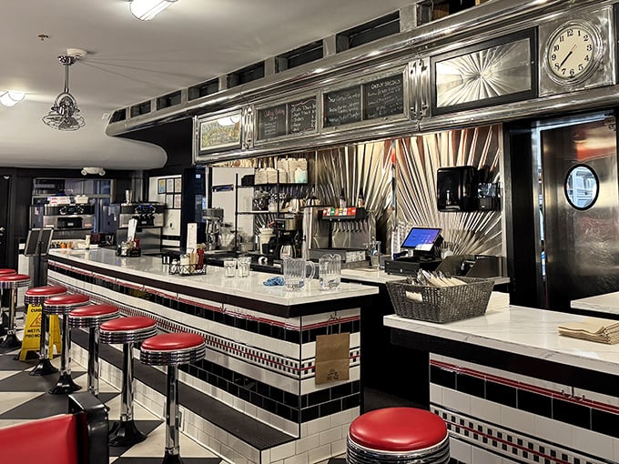 The beating heart of any great diner: a counter where magic happens, coffee flows freely, and staff choreograph the delicate dance of plates and conversation.