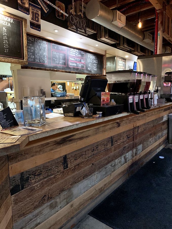 The order counter—where BBQ dreams begin. Those chalkboard menus hold the promise of smoky delights to come.