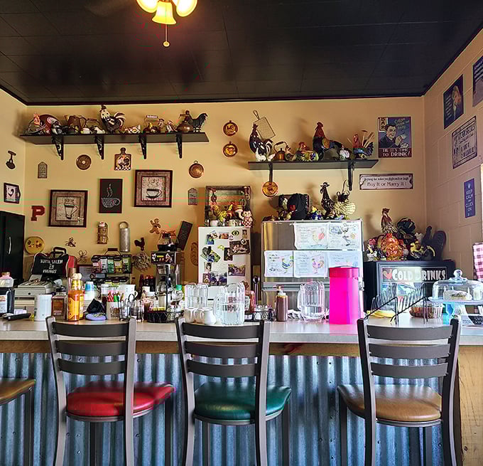 The counter where magic happens – corrugated metal meets comfort food in a space that's equal parts rustic charm and breakfast paradise.