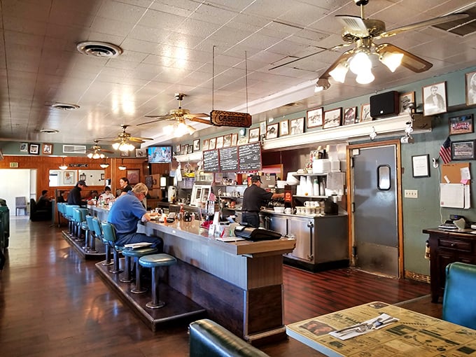 The classic diner counter offers front-row seats to the kitchen action, where culinary magic happens before your eyes.