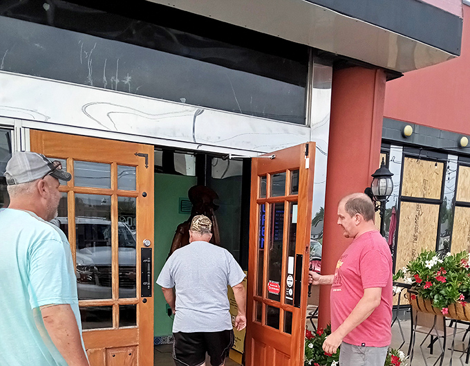 Local diners gather at the entrance, drawn by the promise of exceptional Mexican cuisine and warm hospitality.