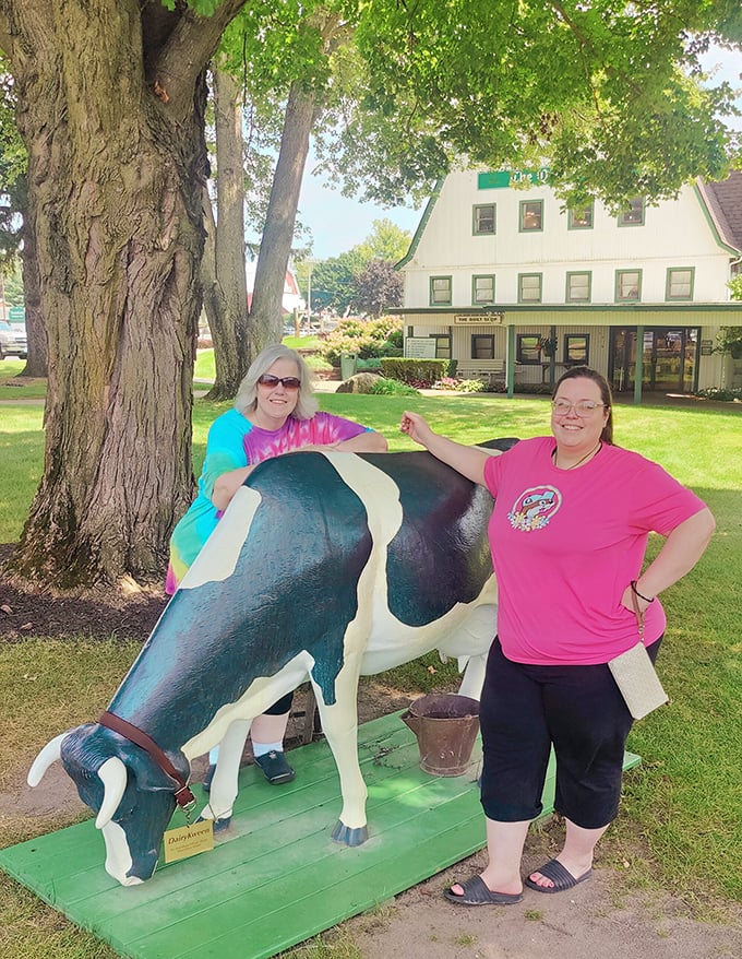 Even the decorative cow statue seems to know it's in good company—a playful nod to the dairy heritage that makes the restaurant's cream pies so legendary.