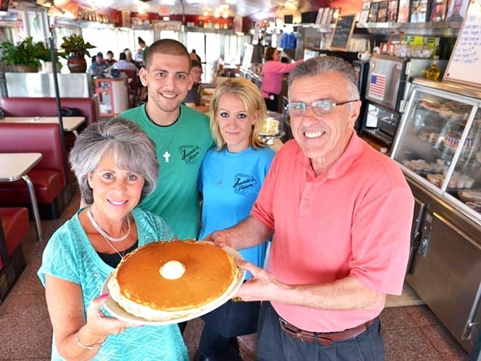 Generations gathering around giant pancakes—creating memories that will last longer than the maple syrup stains on their shirts.