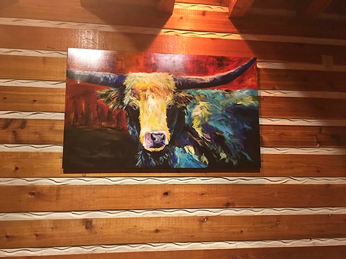 That longhorn painting isn't just watching you eat—it's practically daring you to order another rack of ribs. Challenge accepted.