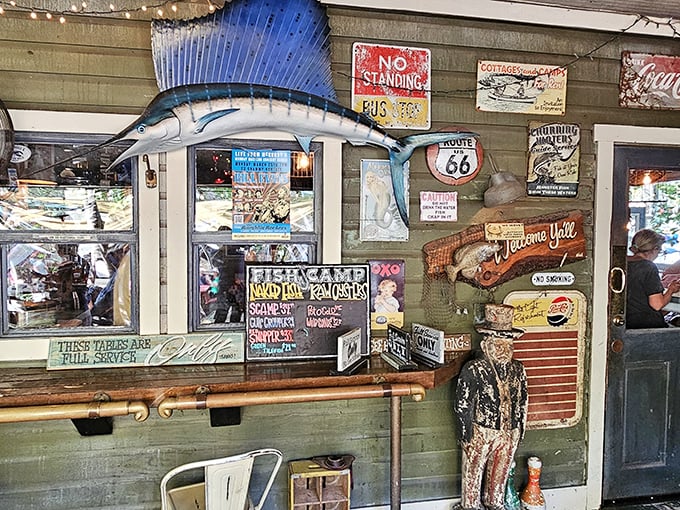 Wall decorations that feel like a fishing shack and maritime museum had a baby – complete with a marlin keeping watch.