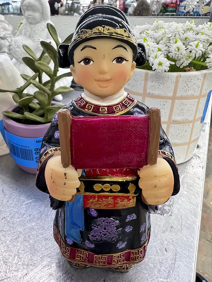 "Hold my scroll," says this cheerful figurine. Asian-inspired decor that adds character without veering into tacky souvenir territory.