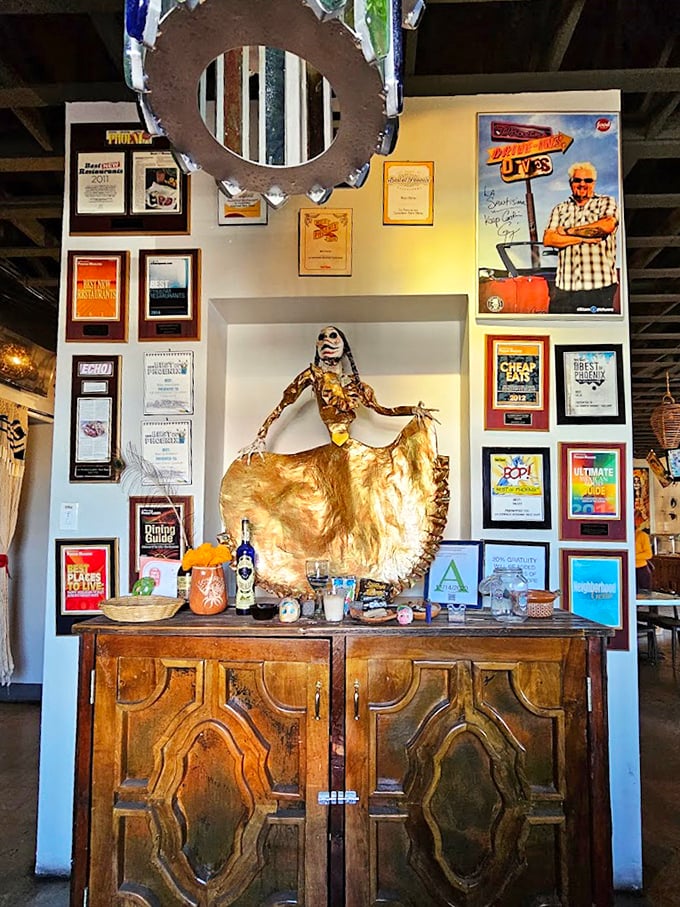 Awards line the walls like trophies in a champion's case—visual proof that your taste buds have made an excellent decision today.
