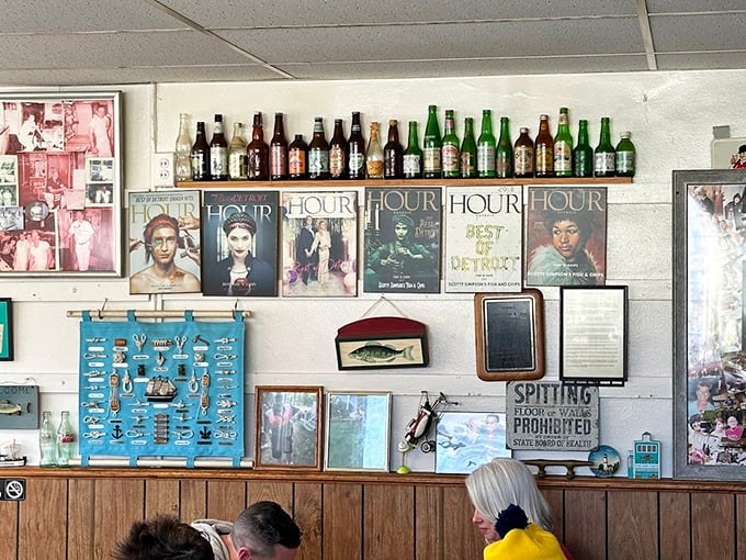 The wall of fame showcases decades of Detroit history, local pride, and the occasional "Hour" magazine cover—a time capsule with your meal.