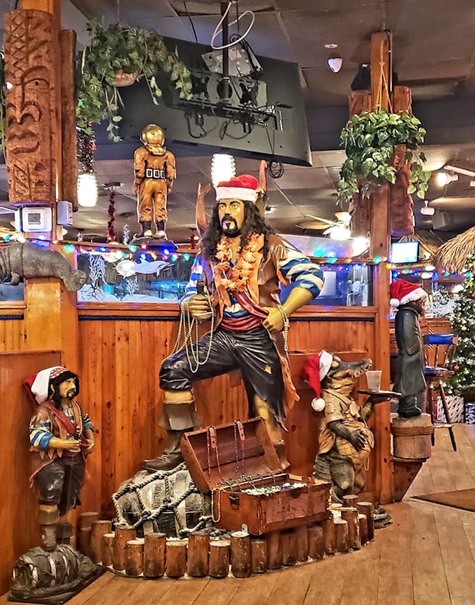 Pirate statues wearing Santa hats prove that even seafaring rogues celebrate the holidays. This decor is so delightfully over-the-top, it circles back to perfect.
